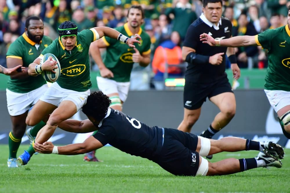 Springboks hold tough for tense win over All Blacks