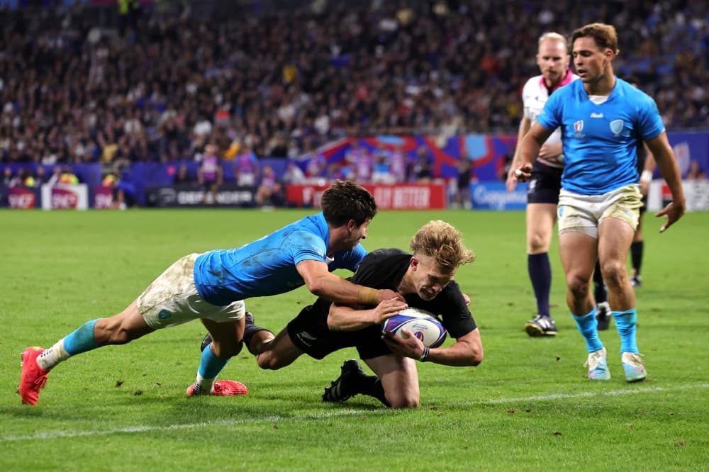 New Zealand in World Cup quarters after 11-try Uruguay thrashing